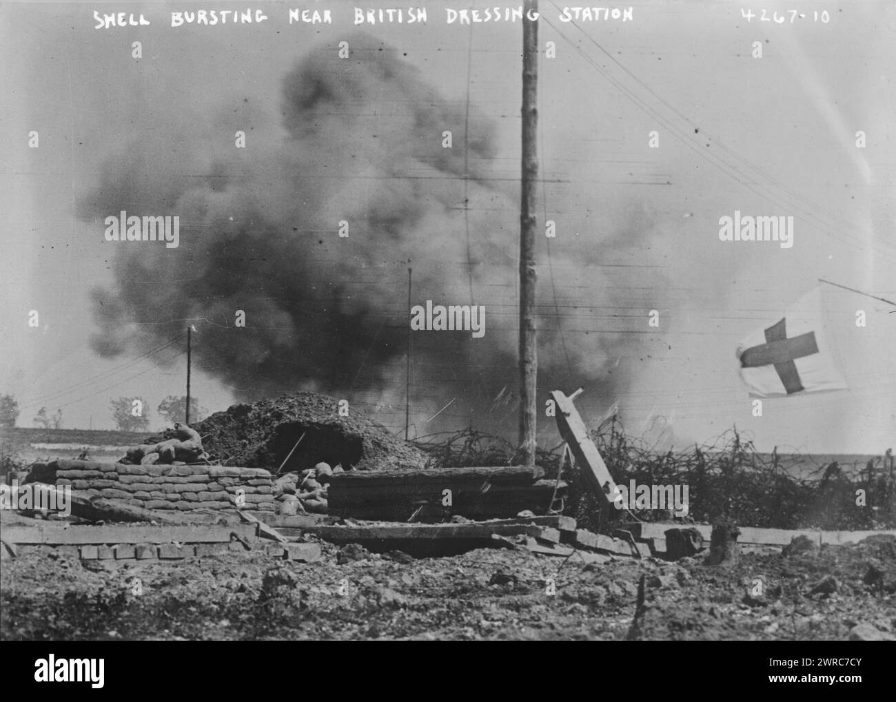 Shell burst near British dressing station, Photograph shows a shell ...