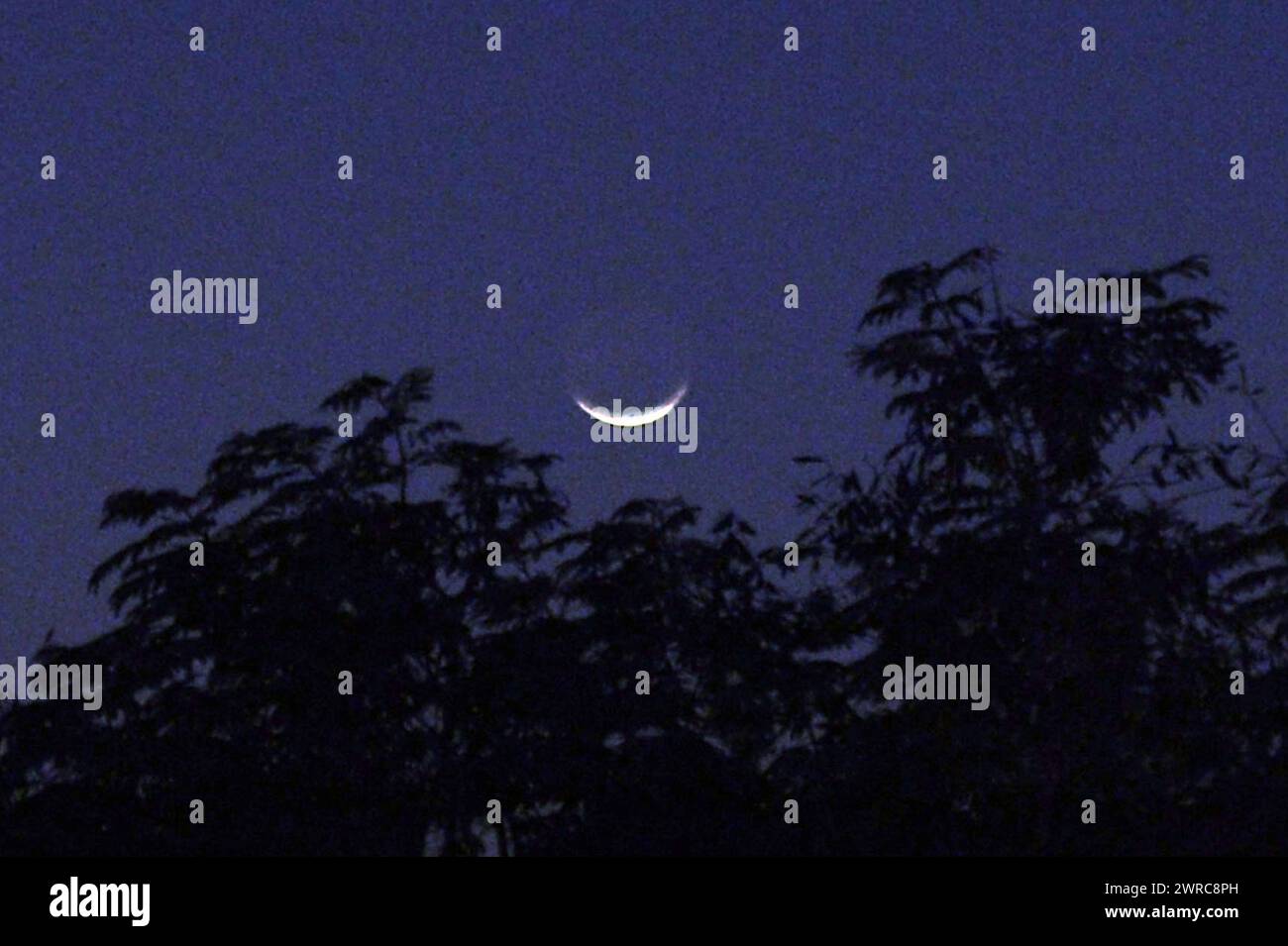 Karachi. 11th Mar, 2024. The crescent moon marking the start of Muslim ...