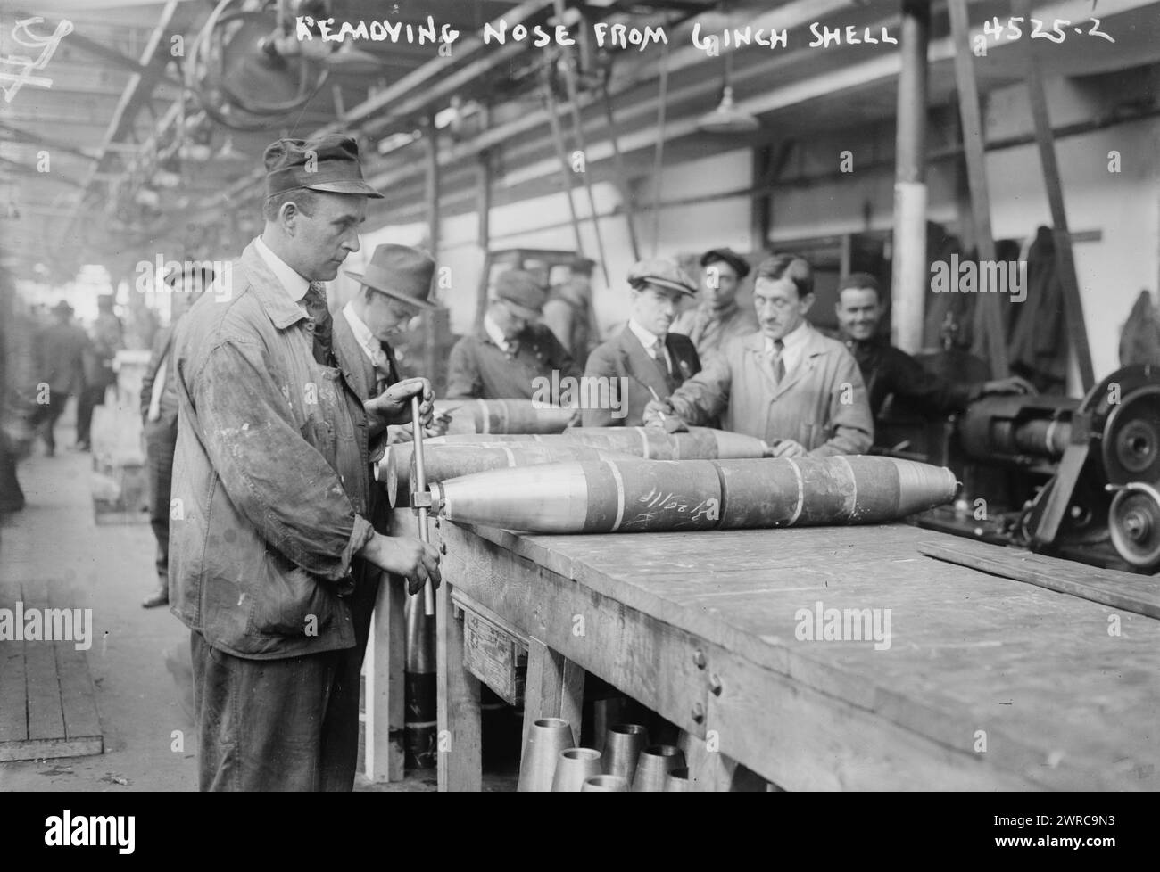 Removing nose from 6 inch shell, between ca. 1915 and ca. 1920, Glass ...