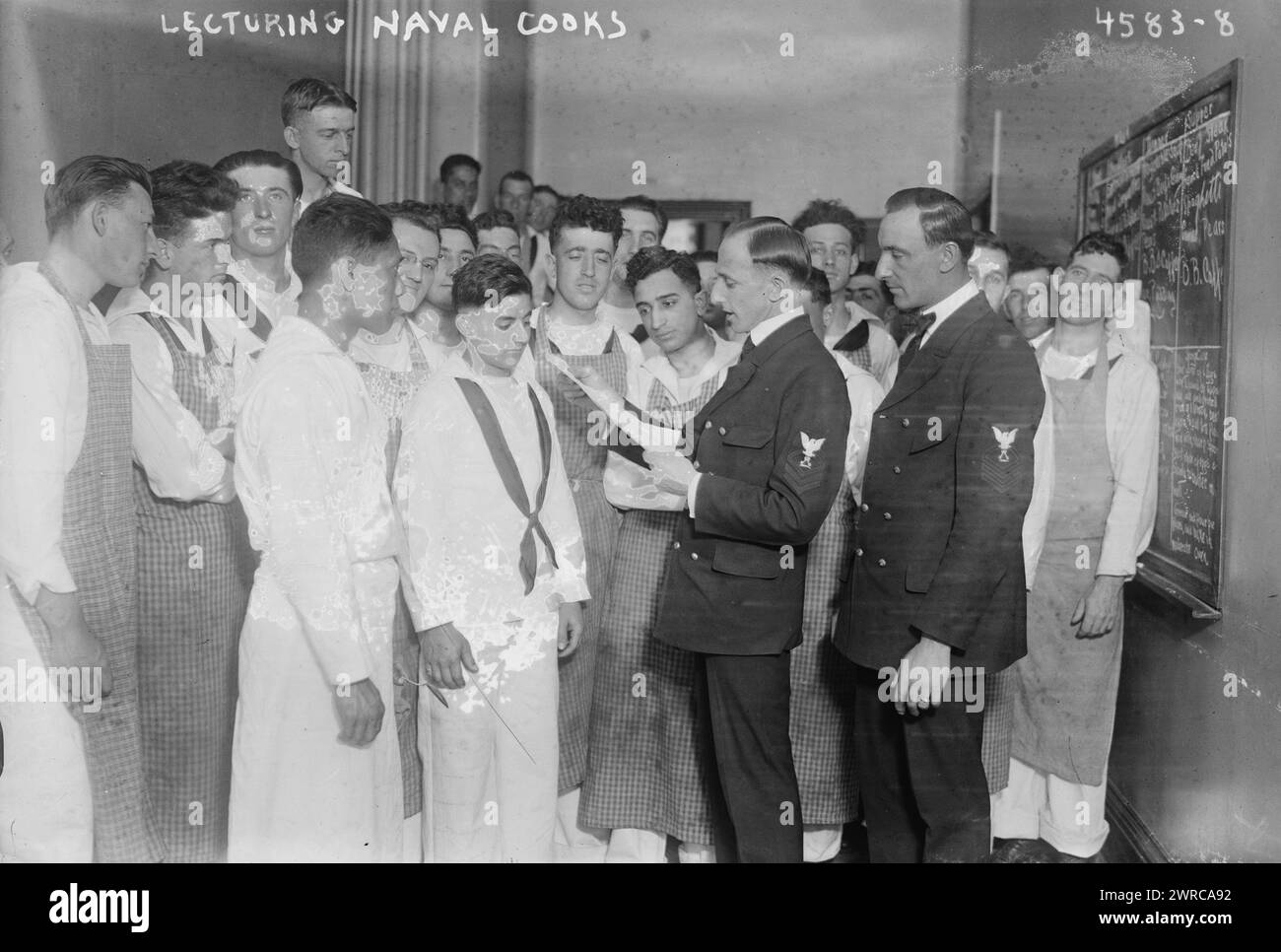 Lecturing naval cooks, Photograph shows students listening to teachers ...