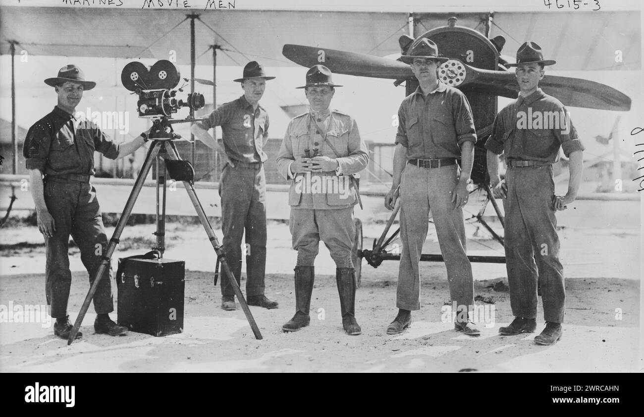Marines' movie men, Photograph shows men in uniform with a movie camera ...