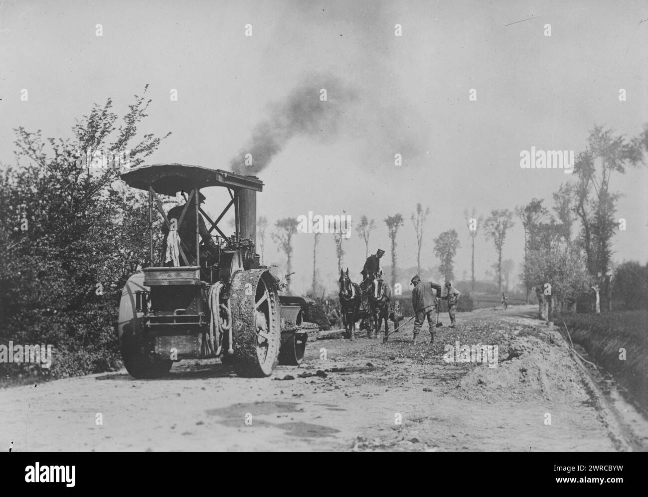 Repairing Belgian Road, Photograph shows men and vehicle repairing a ...