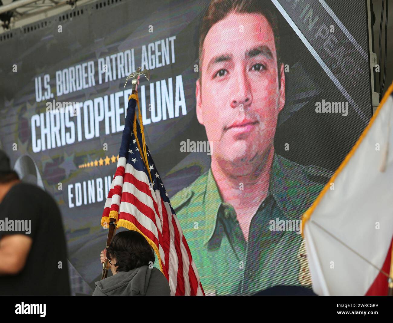 A photo of U.S. Border Patrol agent Christopher Luna is displayed ...