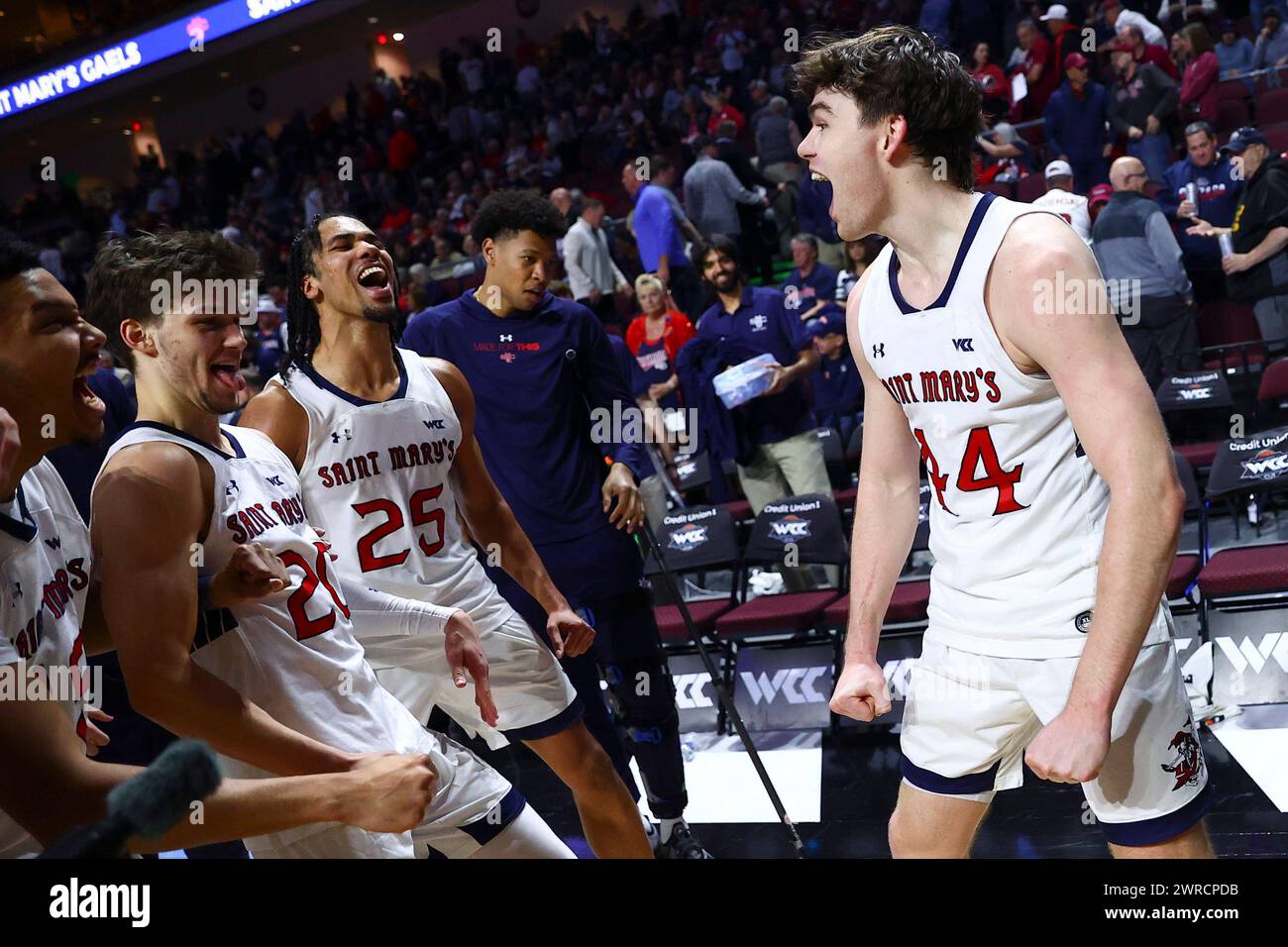 St. Mary's players celebrates after winning an NCAA college basketball ...