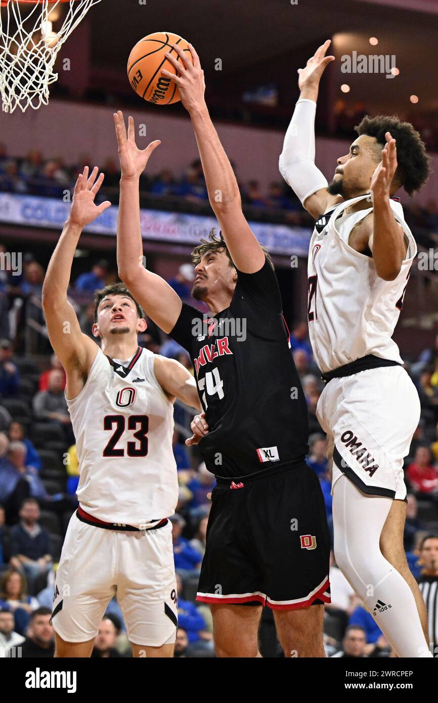 Denver Pioneers forward Isaiah Carr (24) goes up for a shot during an ...