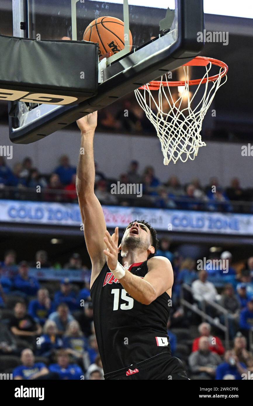 Denver forward Pedro Lopez-Sanvicente (15) goes up for a shot during an ...