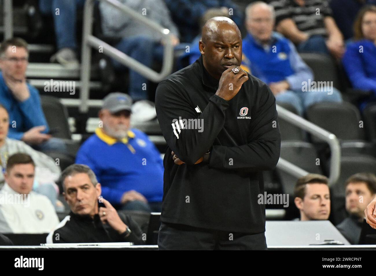 Nebraska-Omaha Mavericks head coach Chris Crutchfield watches the play ...