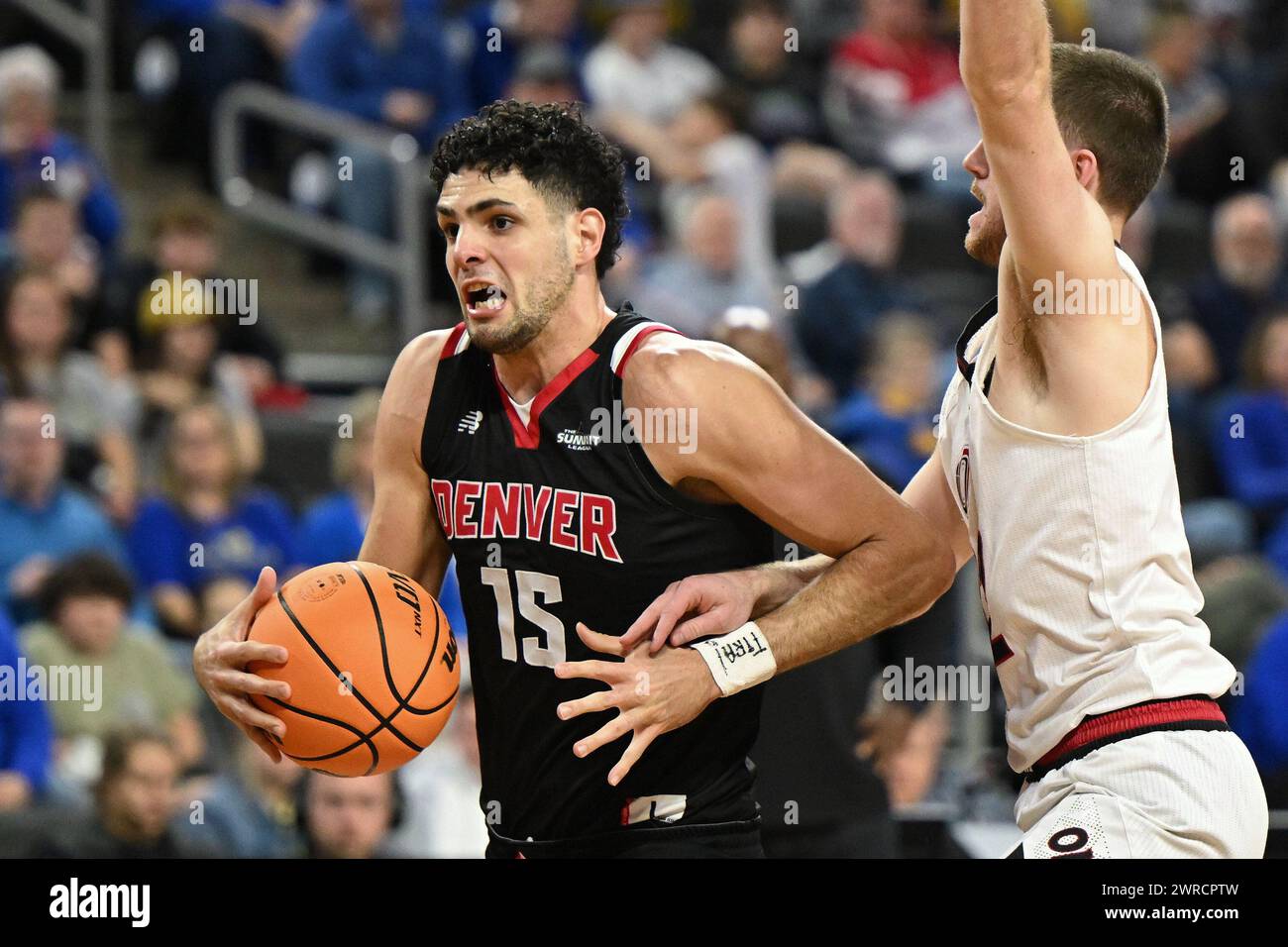 Denver forward Pedro Lopez-Sanvicente (15) drives to the basket during ...