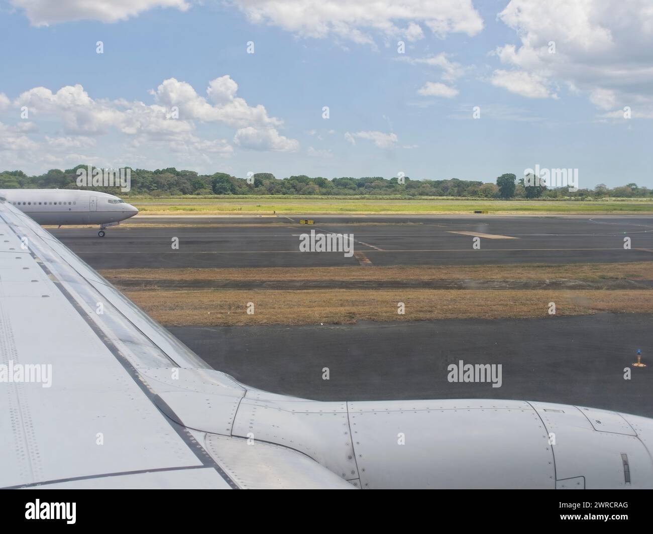 Picture from an airplane on the runway, waiting to take off Stock Photo ...