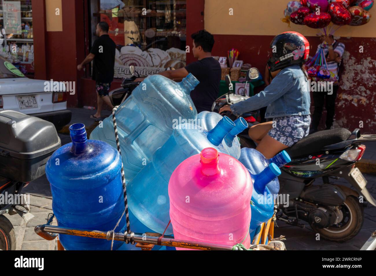 Oaxaca, Mexico - Empty potable water bottles on a cart. They will be ...