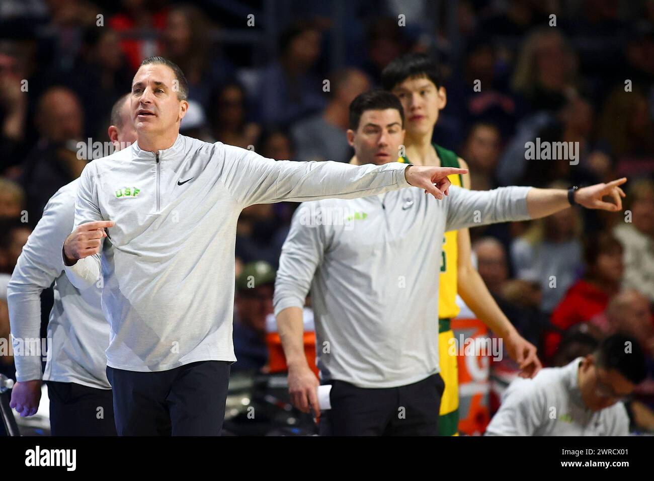 San Francisco head coach Chris Gerlufsen instructs his team from the ...