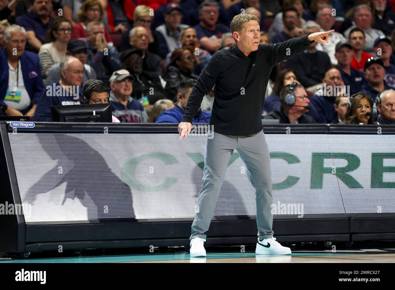 Gonzaga head coach Mark Few instructs his team from the sideline during ...