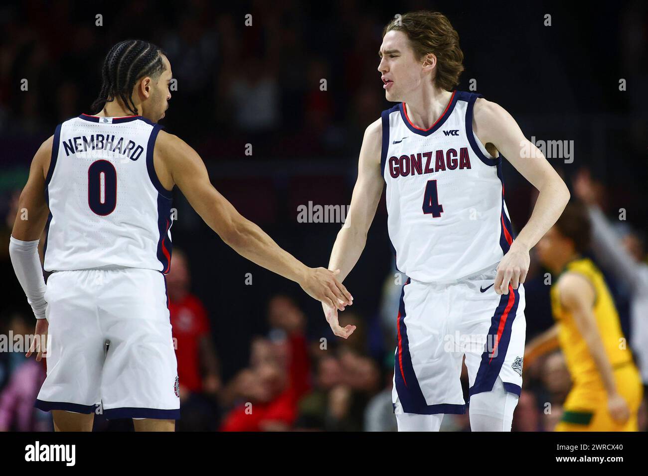 Gonzaga guard Ryan Nembhard (0) and guard Dusty Stromer (4) celebrate after taking a lead over ...