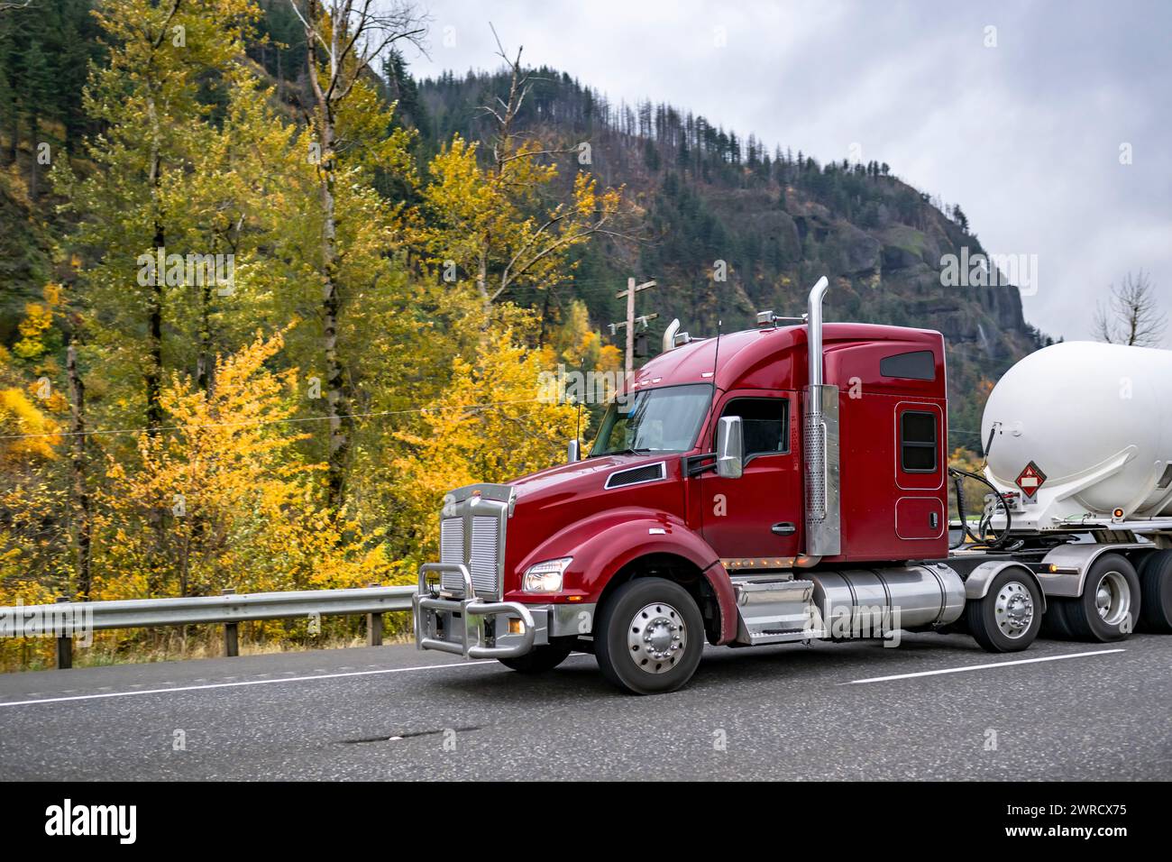 Industrial carrier long hauler burgundy big rig semi truck tractor ...