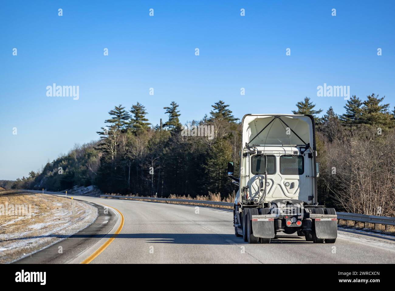 Local carrier white industrial day cab big rig semi trucks tractor with ...