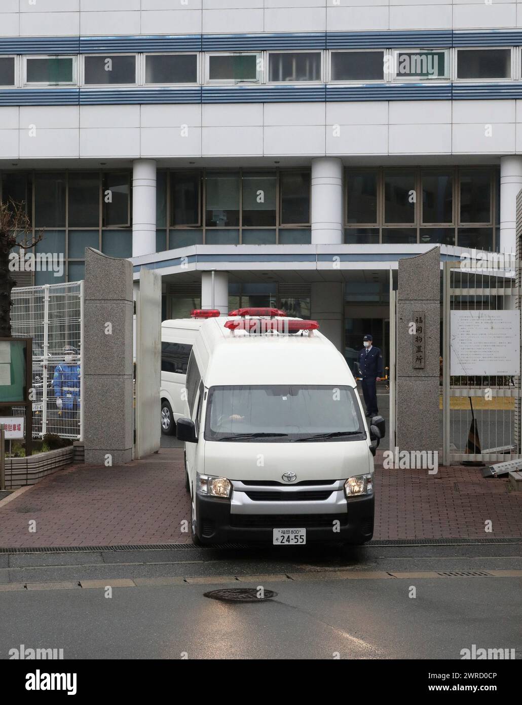 A motorcade believed to be carrying defendants Satoru Nomura and Fumio ...