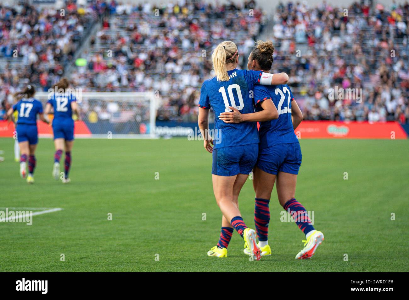 United States midfielder Lindsey Horan (10) celebrates with forward ...