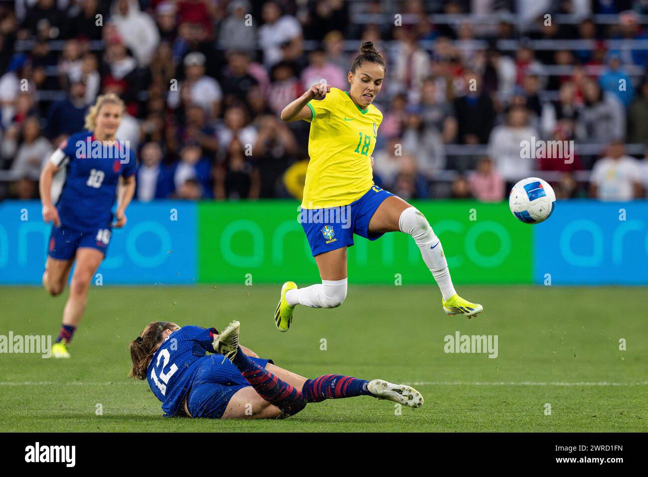 Brazil forward Gabi Portilho (18) evades a slide tackle by United ...