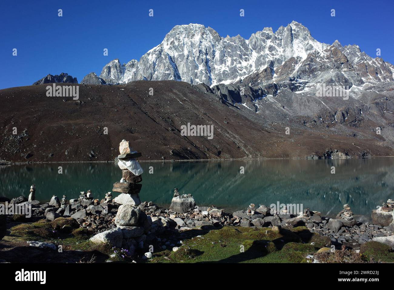 Stone pyramids next to sacred Gokyo lake. Hiking in Nepal Himalayas ...