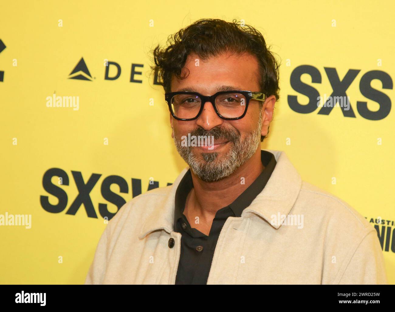 CORRECTS ID - Producer Jomon Thomas arrives for the world premiere of ...