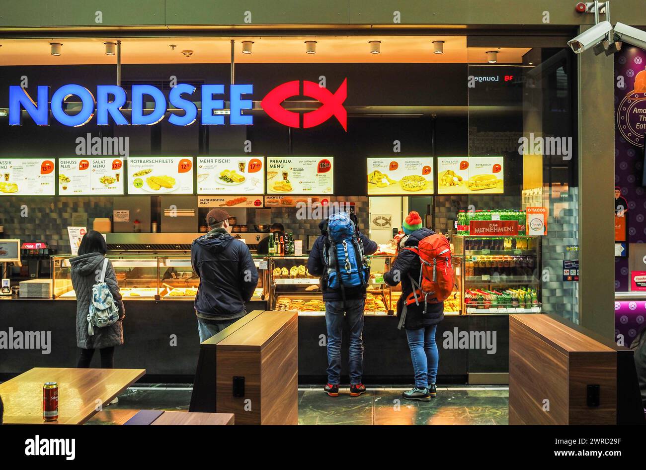 People seen at the fast food restaurant, Nordsee in the main hall of ...
