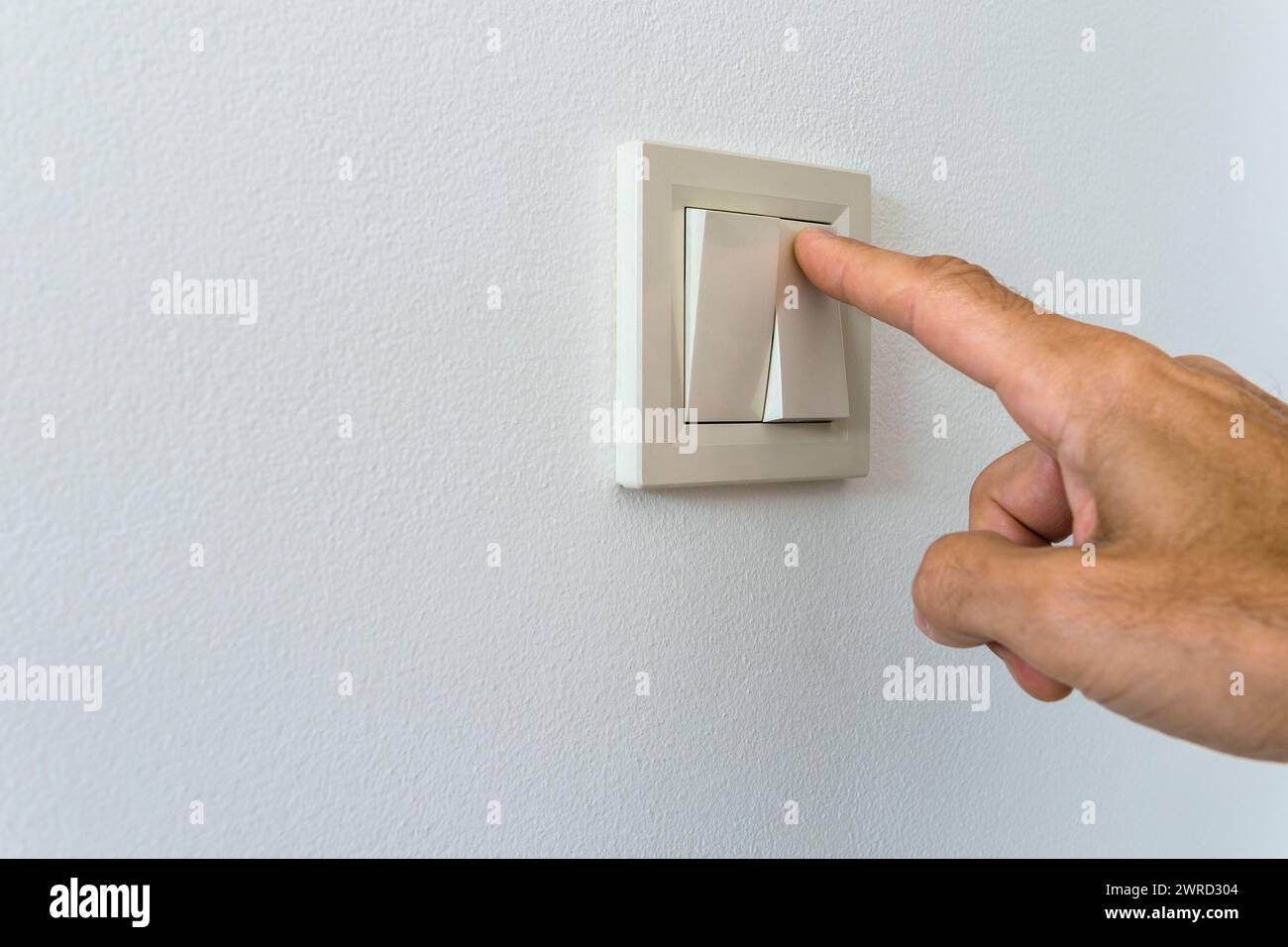 Light switch finger hi-res stock photography and images - Alamy