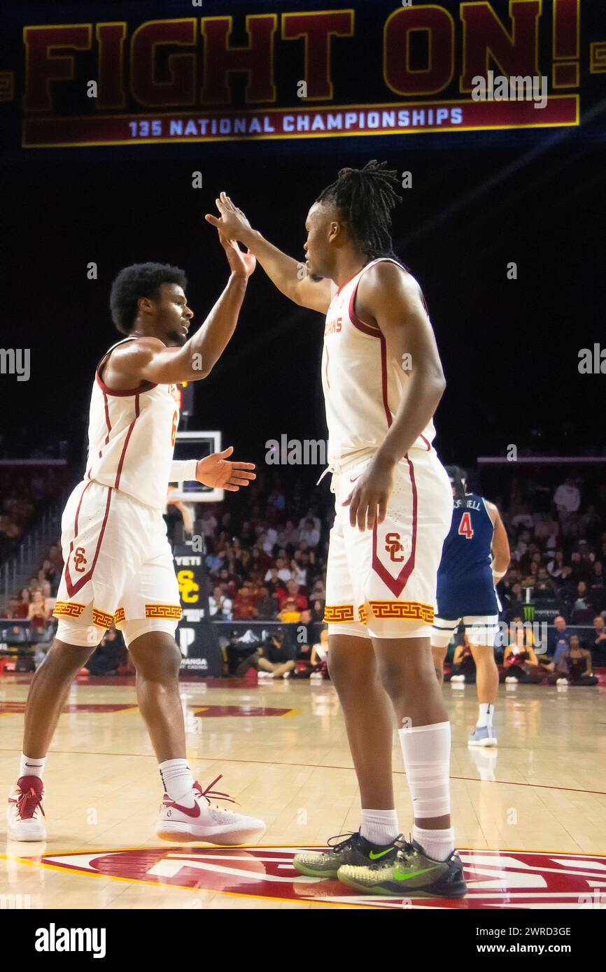 USC Trojans guard Bronny James (6) lhi-fives guard Isaiah Collier (1 ...