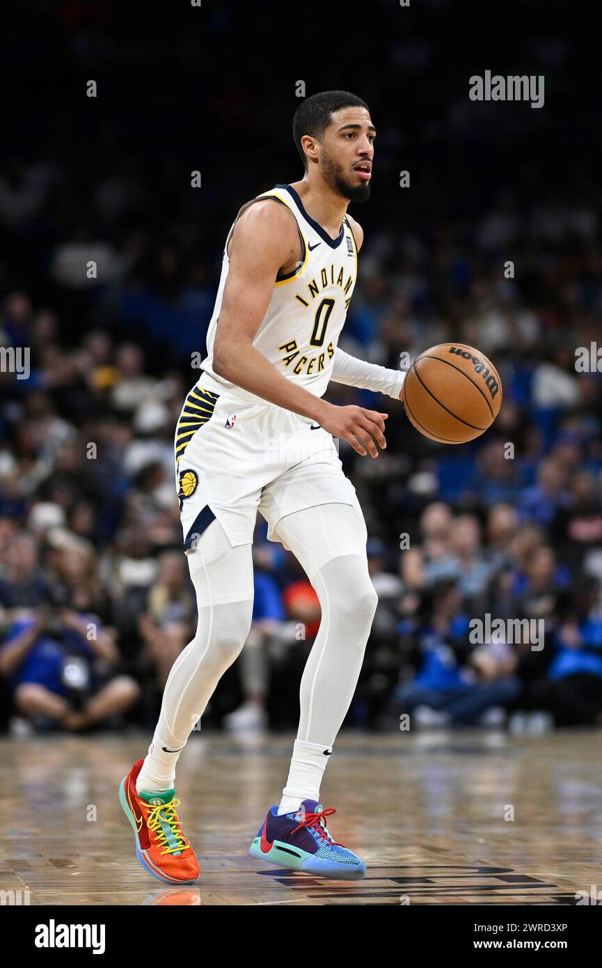 Indiana Pacers guard Tyrese Haliburton (0) brings the ball up the court ...