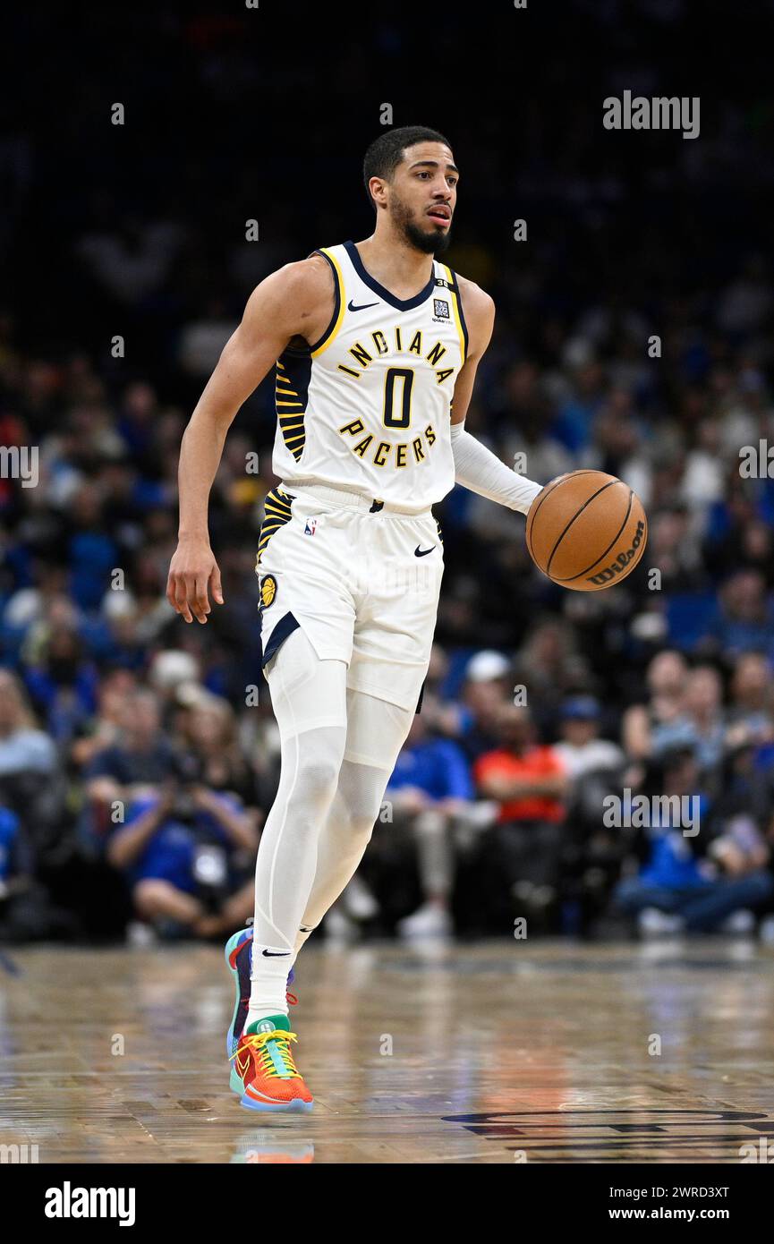Indiana Pacers guard Tyrese Haliburton (0) brings the ball up the court ...