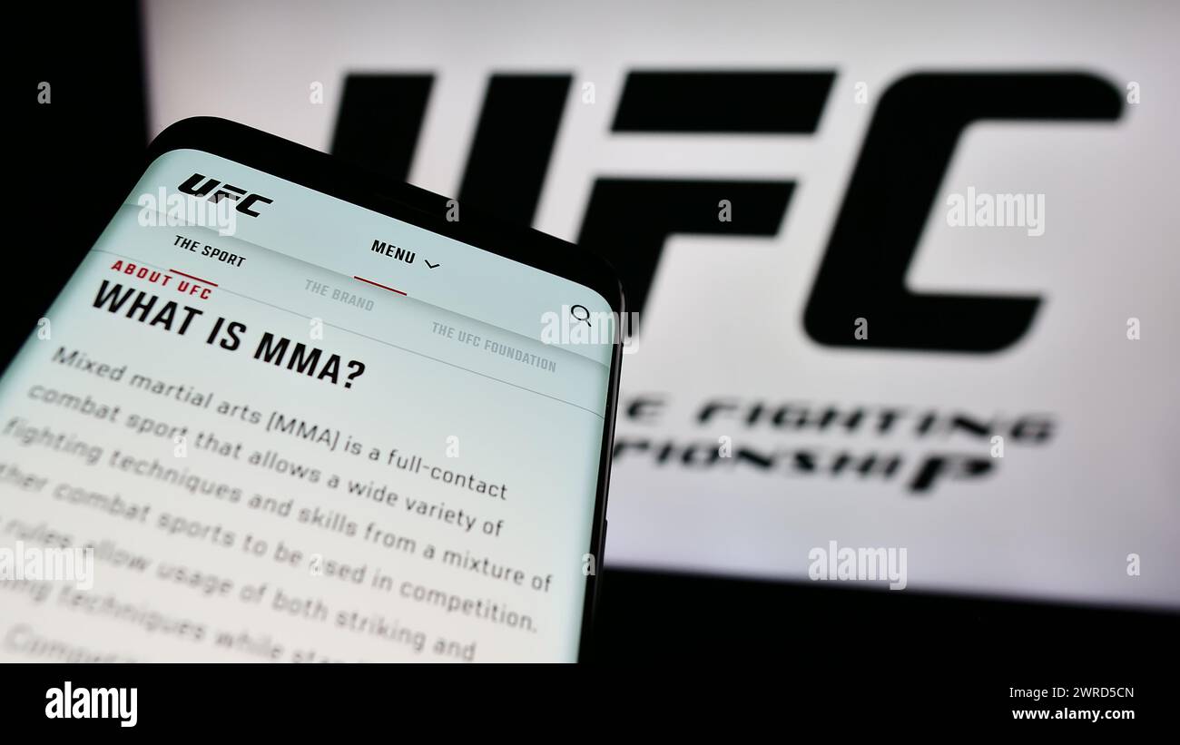 Mobile phone with website of martial arts company Ultimate Fighting ...