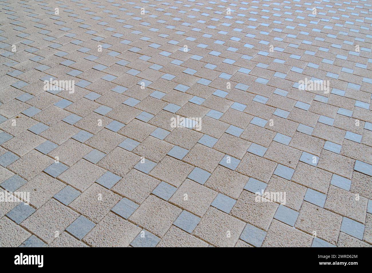 Texture of paving tiles. A parkway paved with paving tiles. close-up of ...