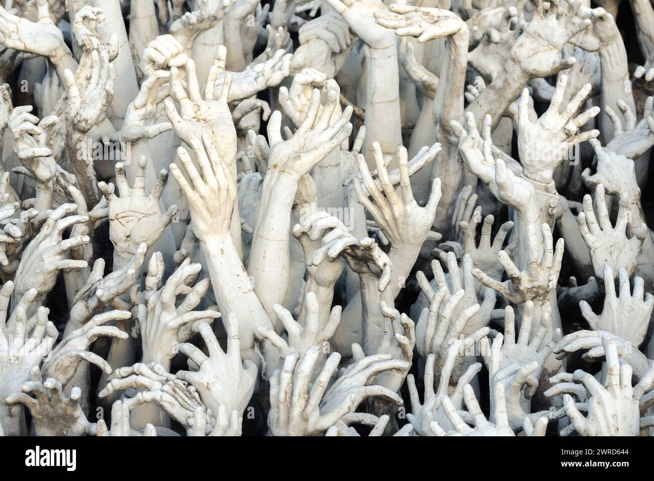 Chiang Rai, Thailand - December 2022: famous hands from hell art on the territory of White ...