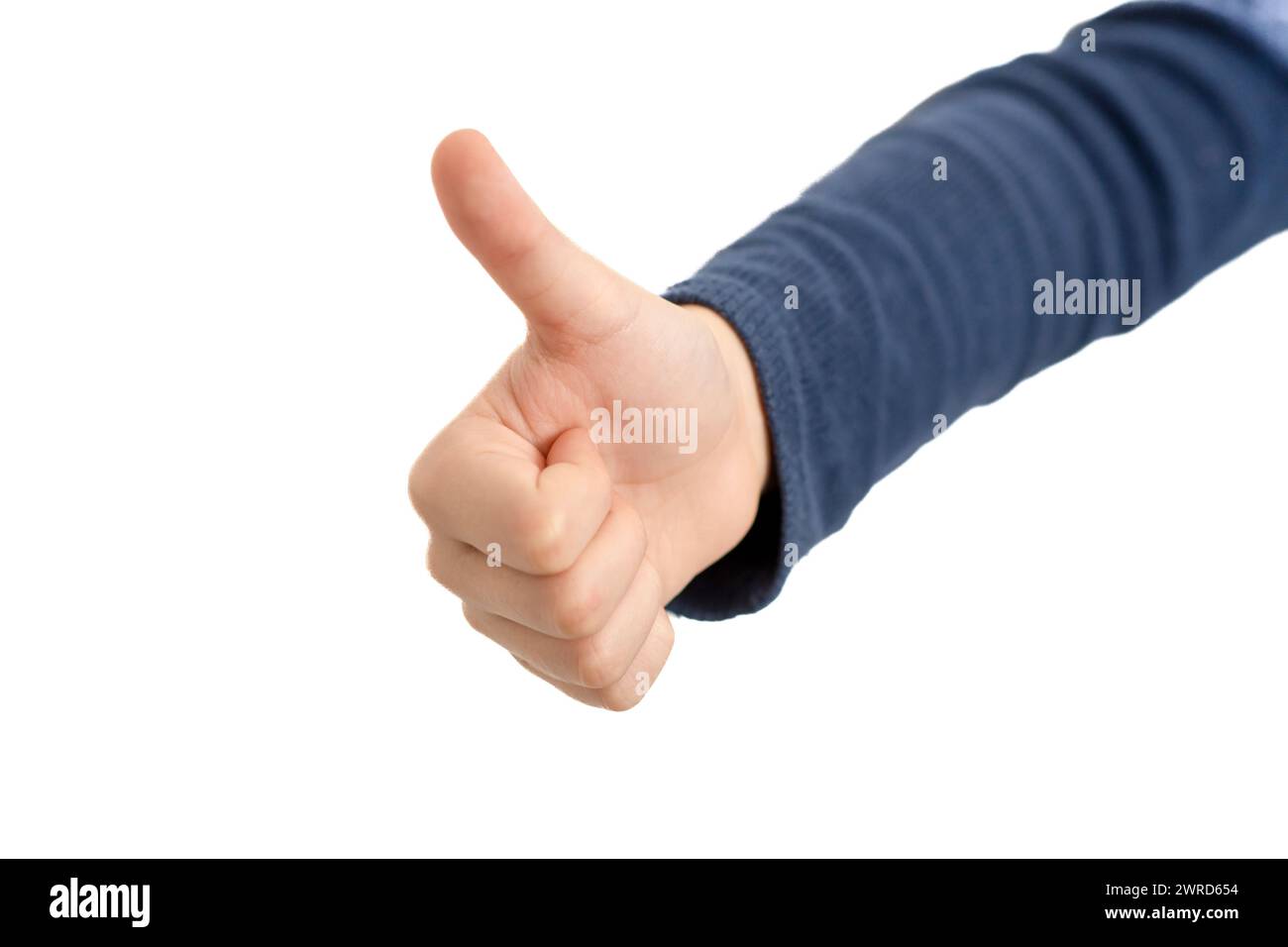 Close-up of a kid's hands giving a thumbs-up, a symbol of approval and ...