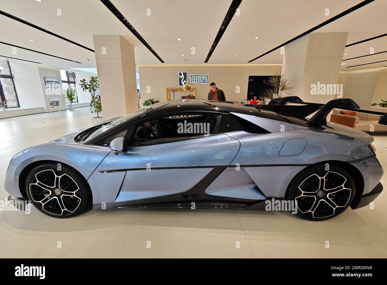 SHANGHAI, CHINA - MARCH 12, 2024 - Customers experience the YANGWANG U9 supercar model of BYD's ...