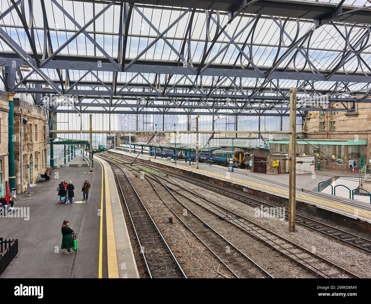 Passengers wait in railway hi-res stock photography and images - Alamy