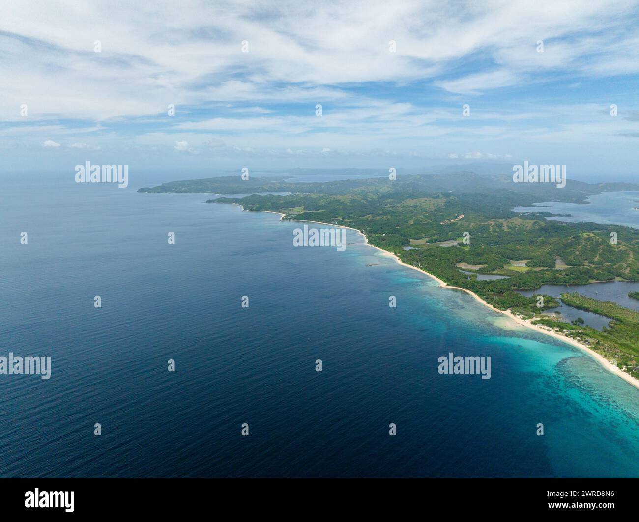 Tropical coastline with white sandy beach. Agmanic Lake in Santa Fe ...
