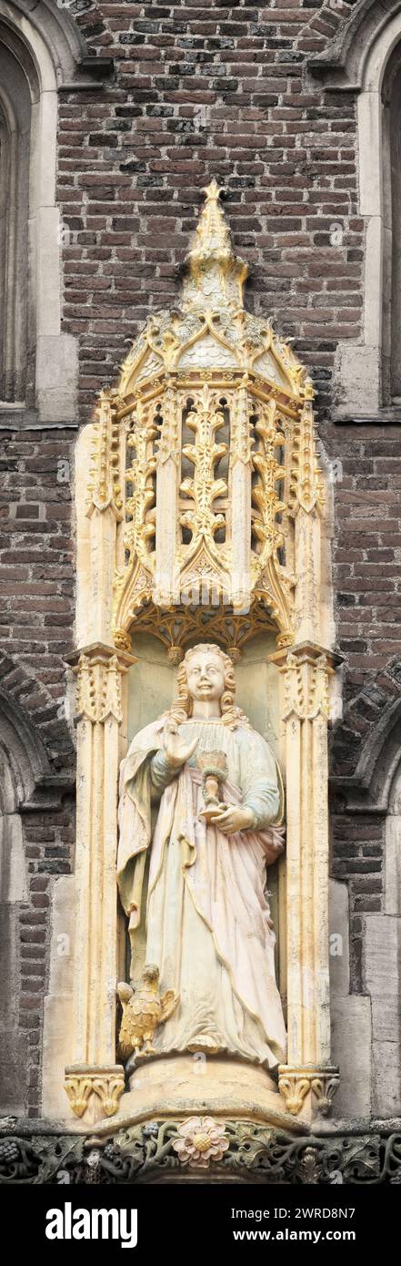 Statue of St John, the disciple of Jesus, on an outside wall lof St ...