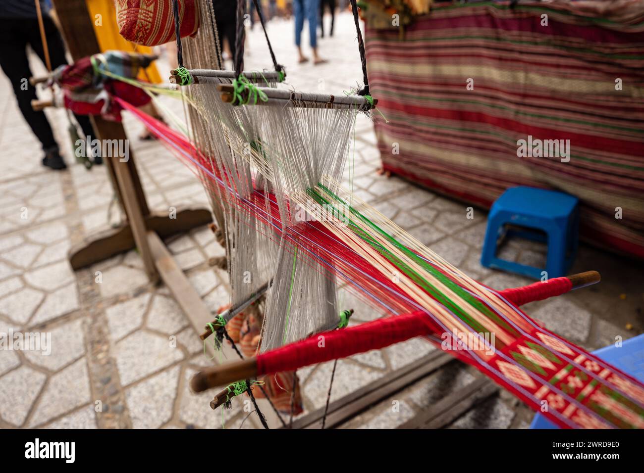 Old method of weaving with a loom in vietnam Stock Photo - Alamy