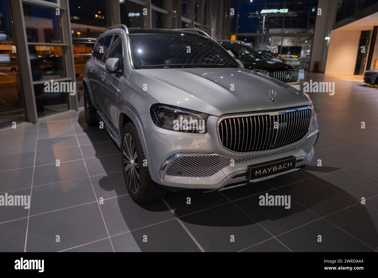 new electric silver Maybach GLS SUV, car in showroom, EV Mercedes-Benz ...