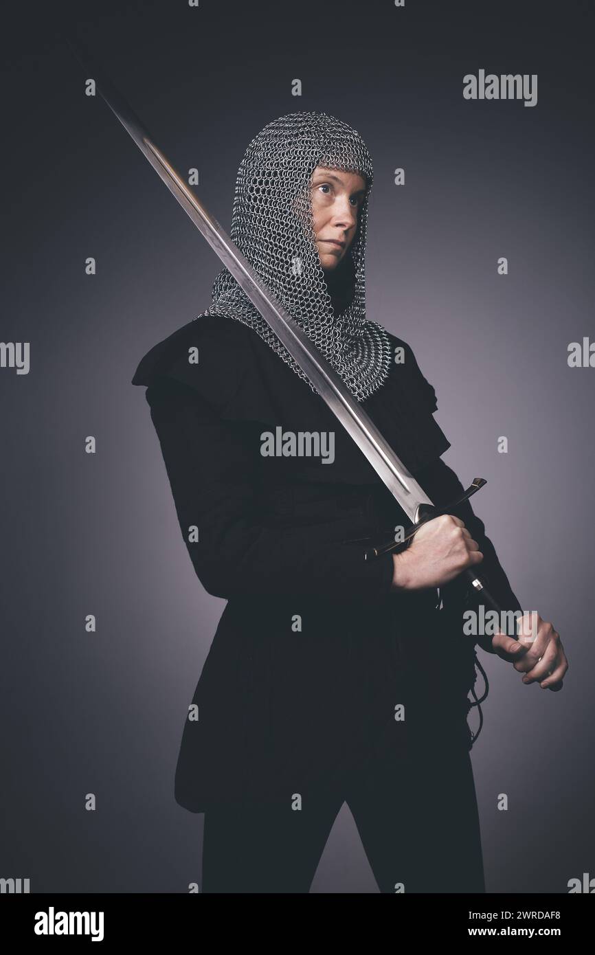 Medieval infantry armed woman dressed in chain armor Stock Photo - Alamy