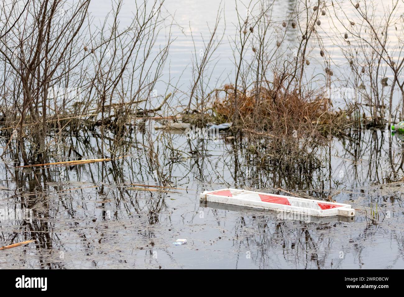 Plastic waste in a water body Stock Photo - Alamy