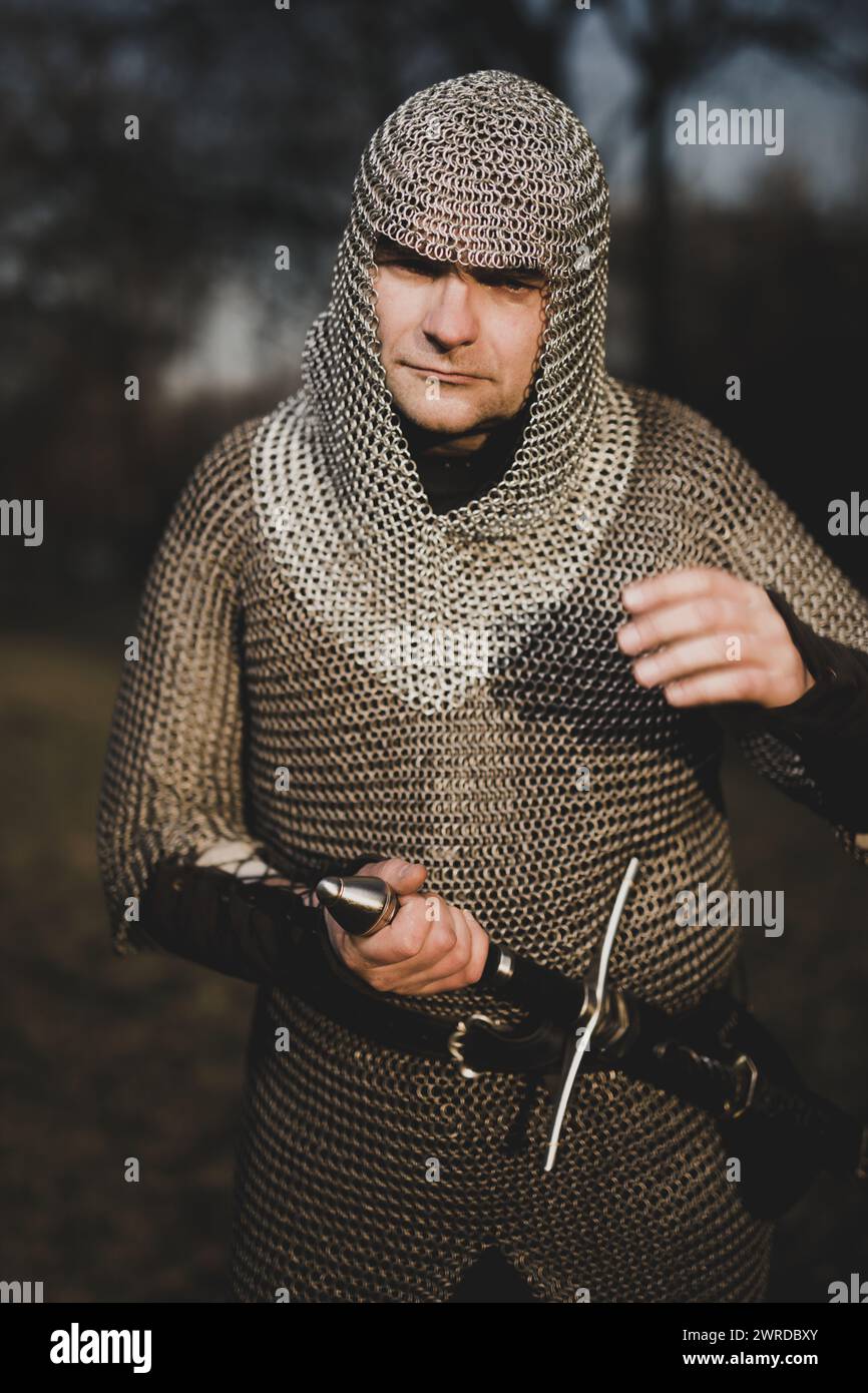 Medieval infantry armed man dressed in chain armor outdoor Stock Photo ...