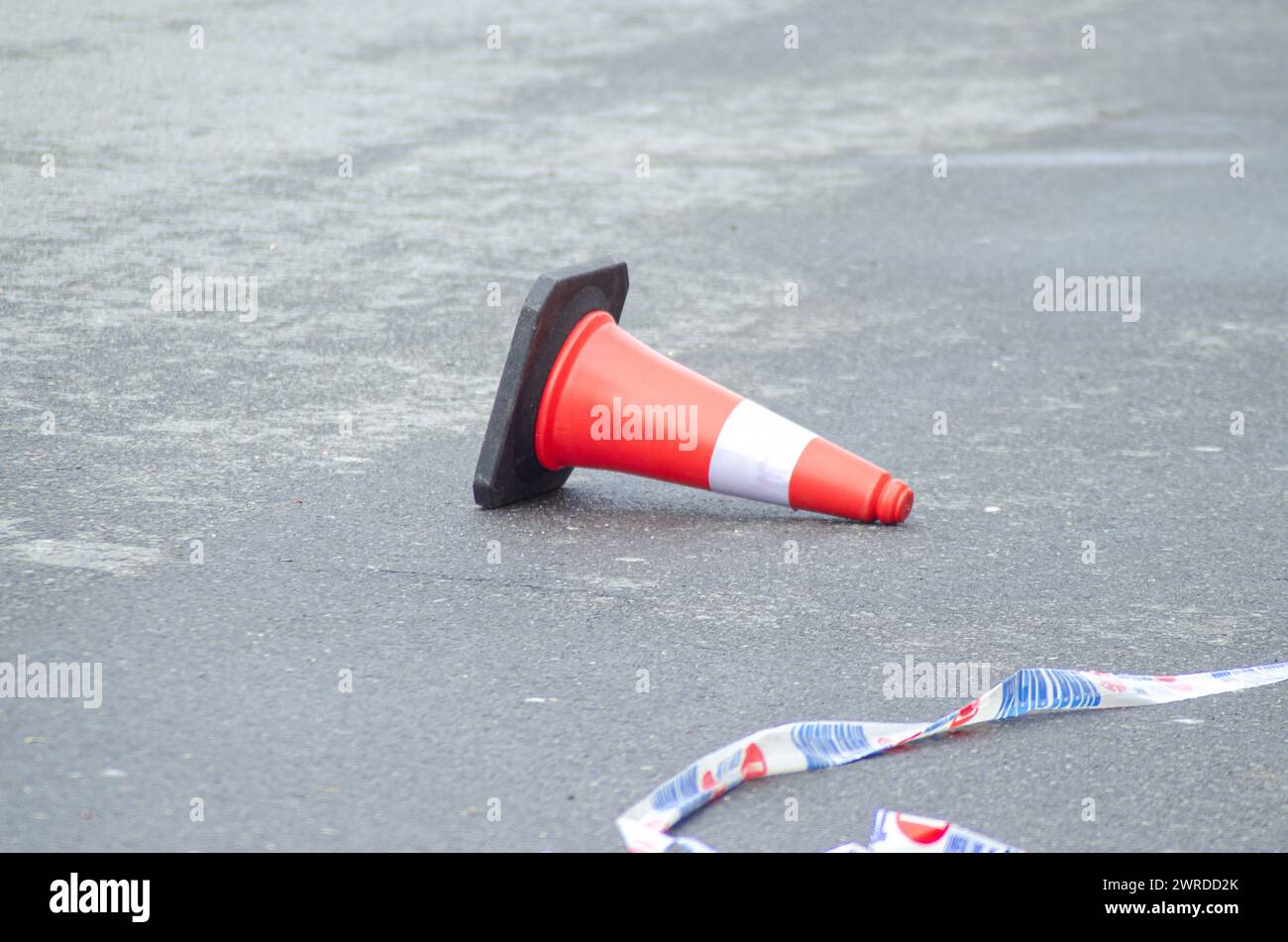 signaling cone lying on the ground Stock Photo - Alamy