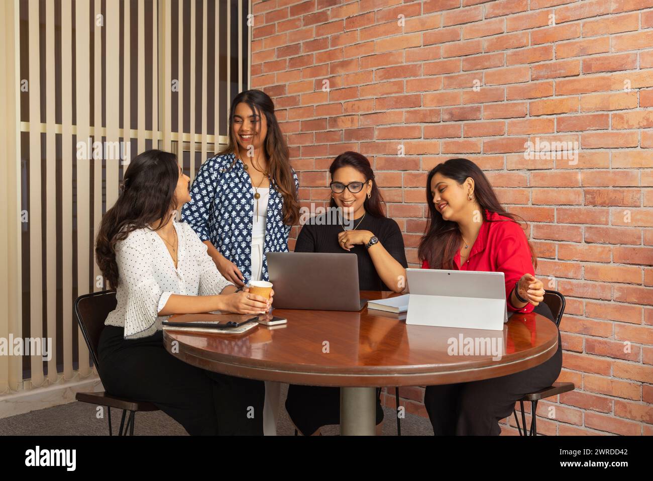 Group of businesswomen having a business meeting in office conference ...