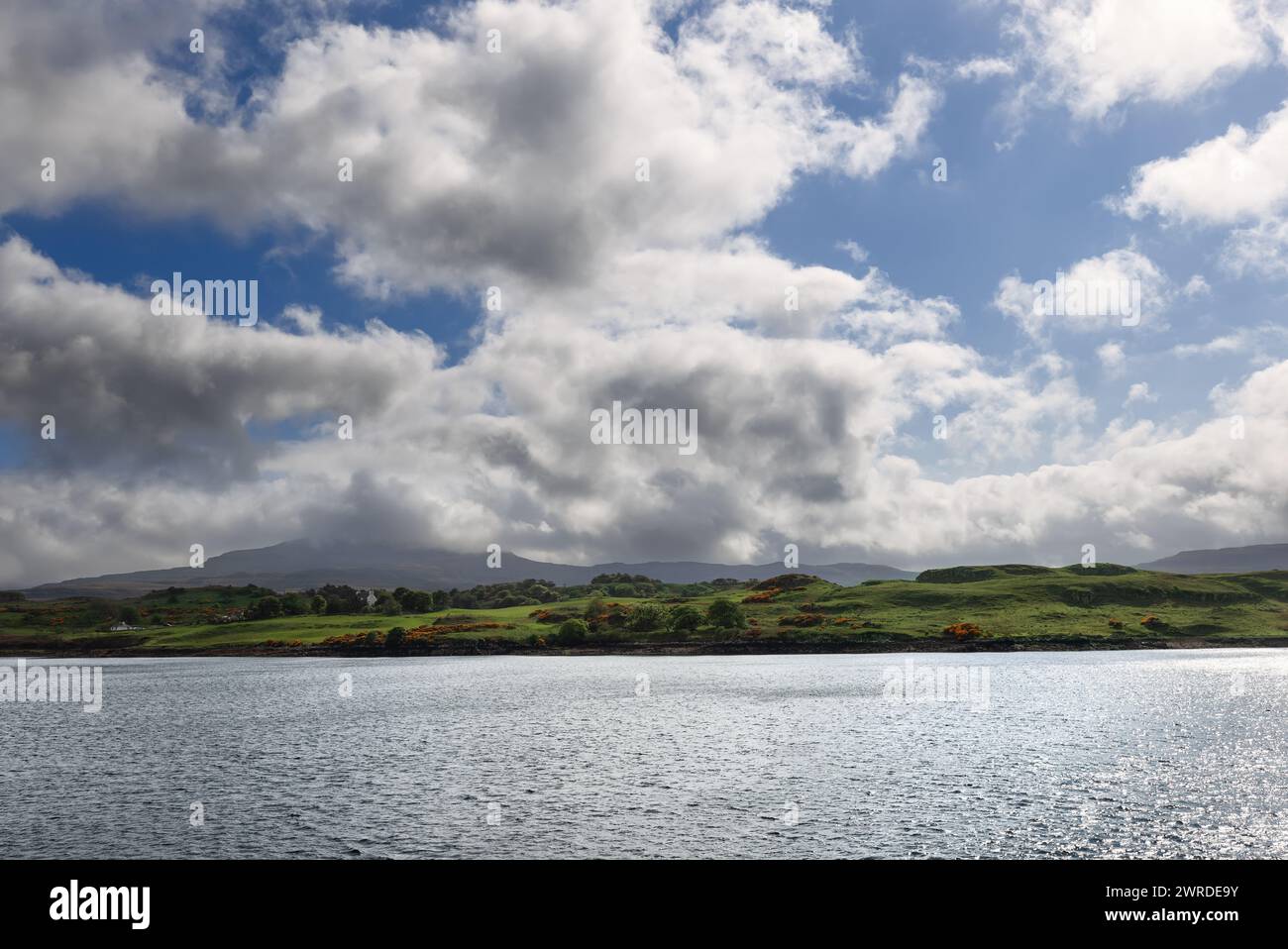 A serene seascape captures the tranquility of the waters near Skye ...