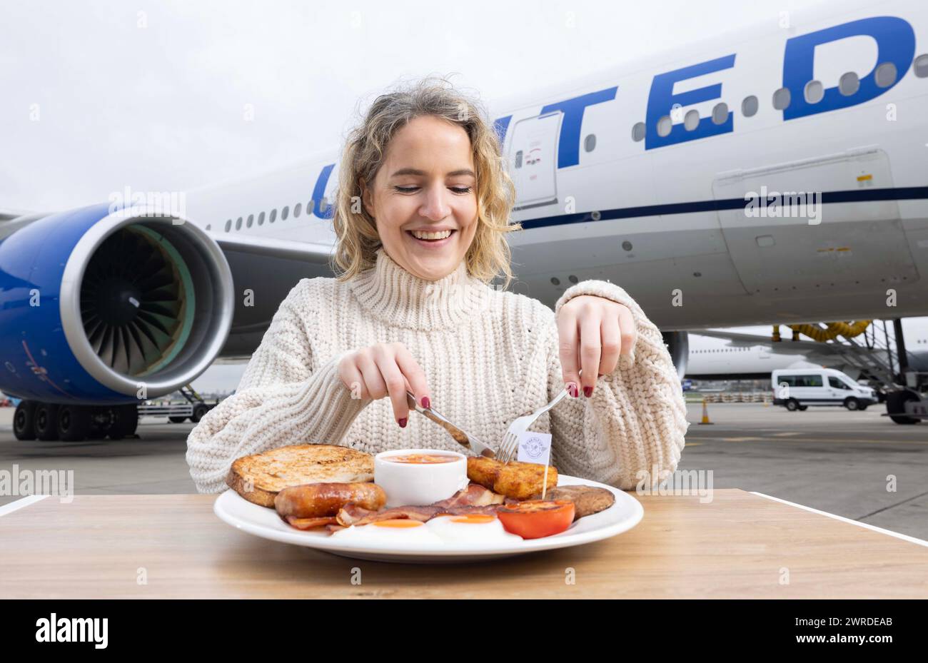 EDITORIAL USE ONLY Kate eats a renewable biofuel English breakfast from ...