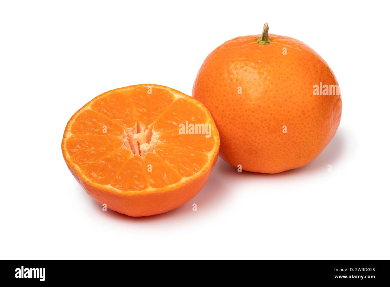 Whole and halved fresh ripe healthy Leanri mandarins isolated on white ...