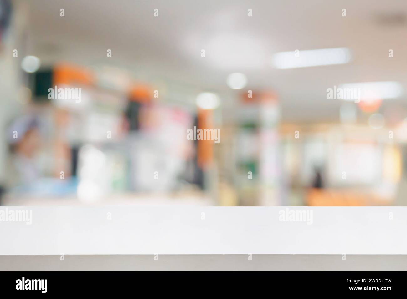 white counter with hospital or clinic interior blurred for background ...