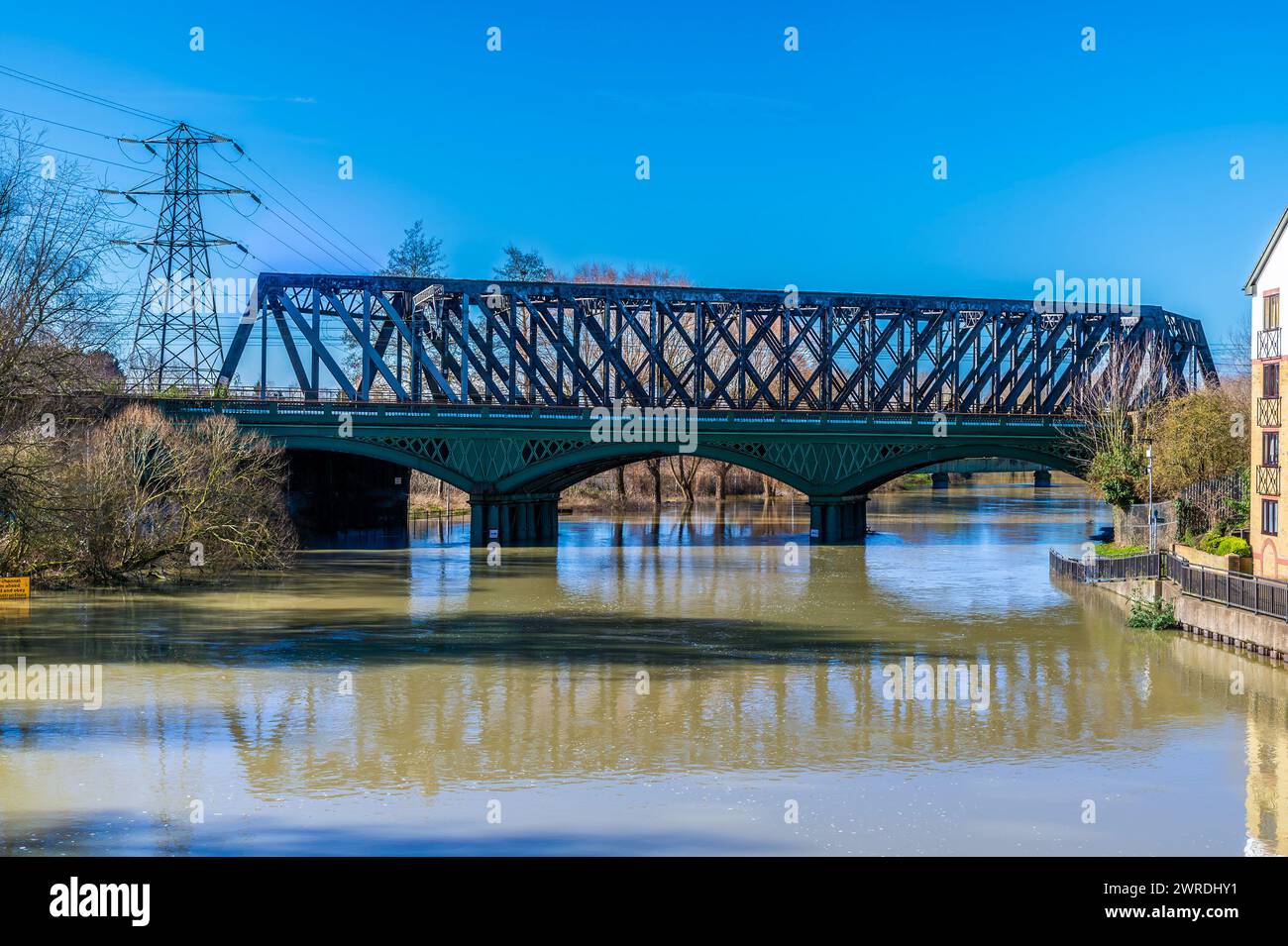 A close up view towards the historic cast iron railway bridge over the ...