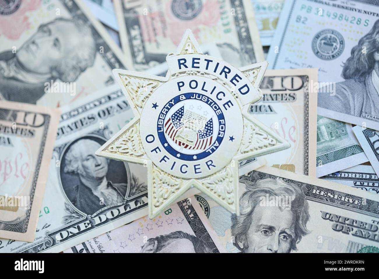 KYIV, UKRAINE - MARCH 9, 2024 US Retired Police Officer badge on many ...